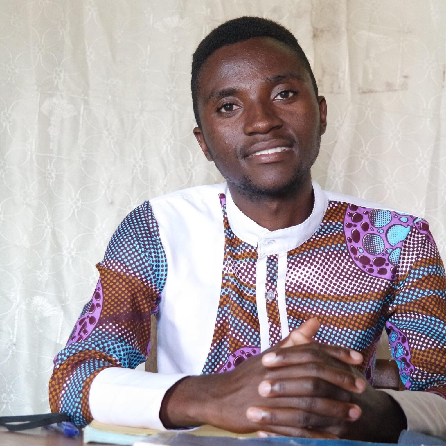 Hi. I'm Mugisha Namwangwa Christophe.